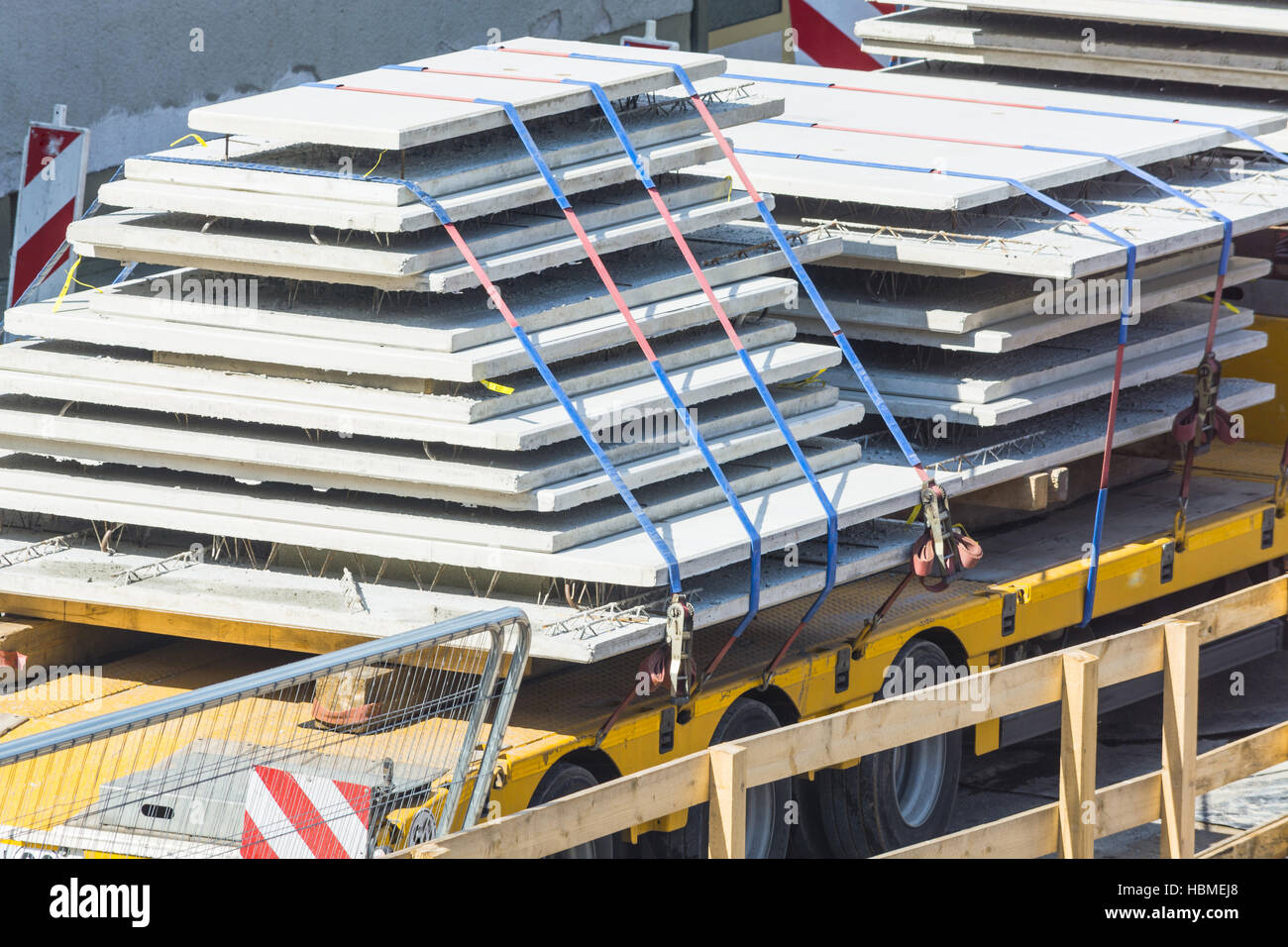 Precast concrete walls on a truck Stock Photo - Alamy