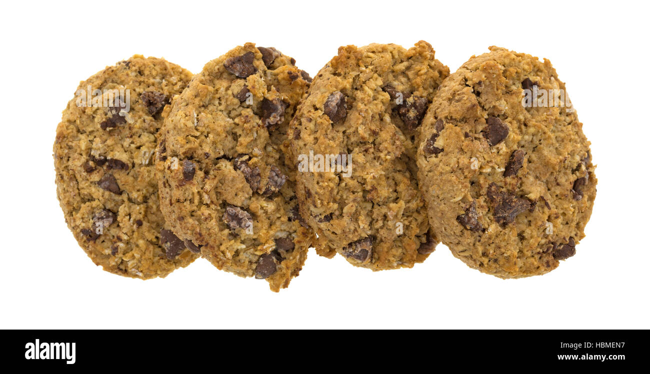 A row of chocolate chip oatmeal cookies isolated on a white background ...