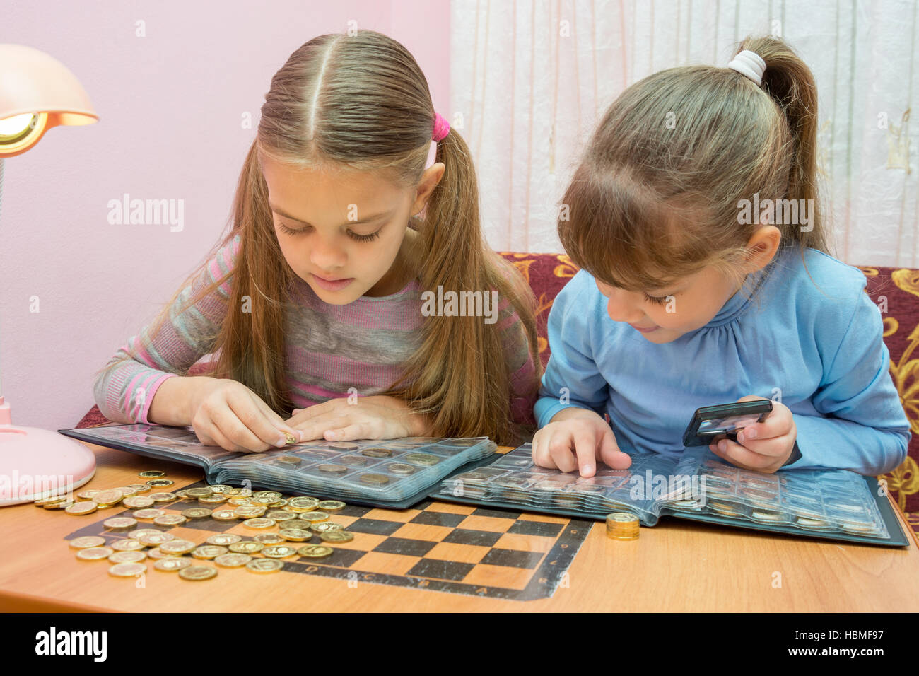 Children collection coin hi-res stock photography and images - Alamy