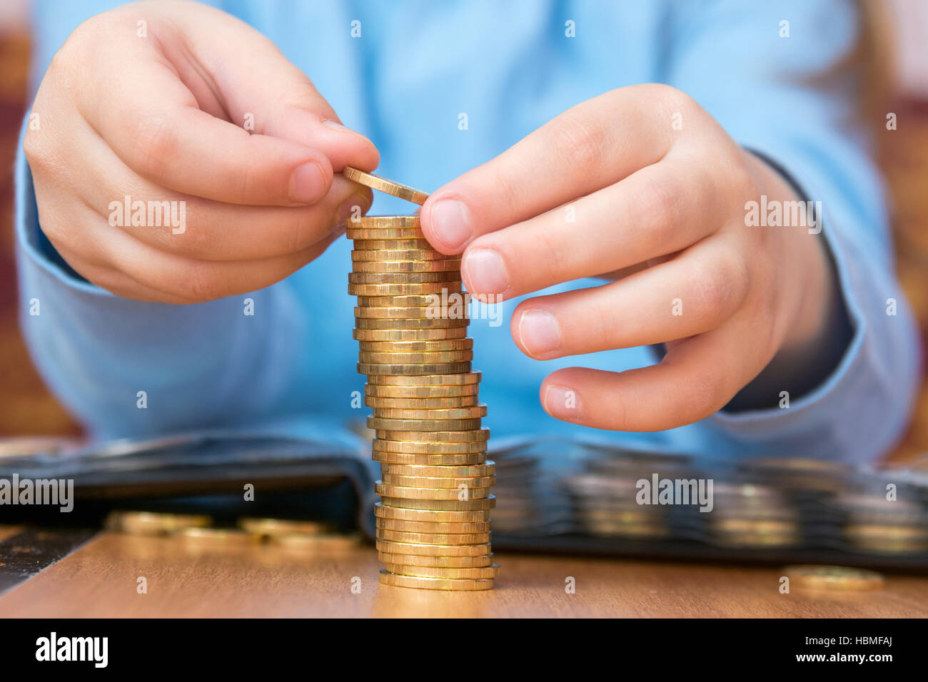 Child Collects Money High Resolution Stock Photography and Images - Alamy