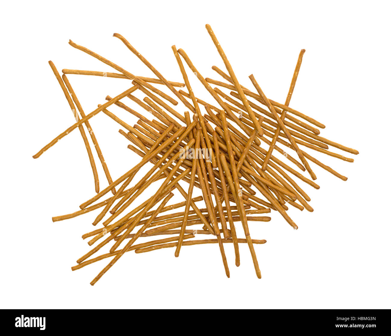 Top view of a jumble of salted whole wheat bretzel sticks isolated on a ...