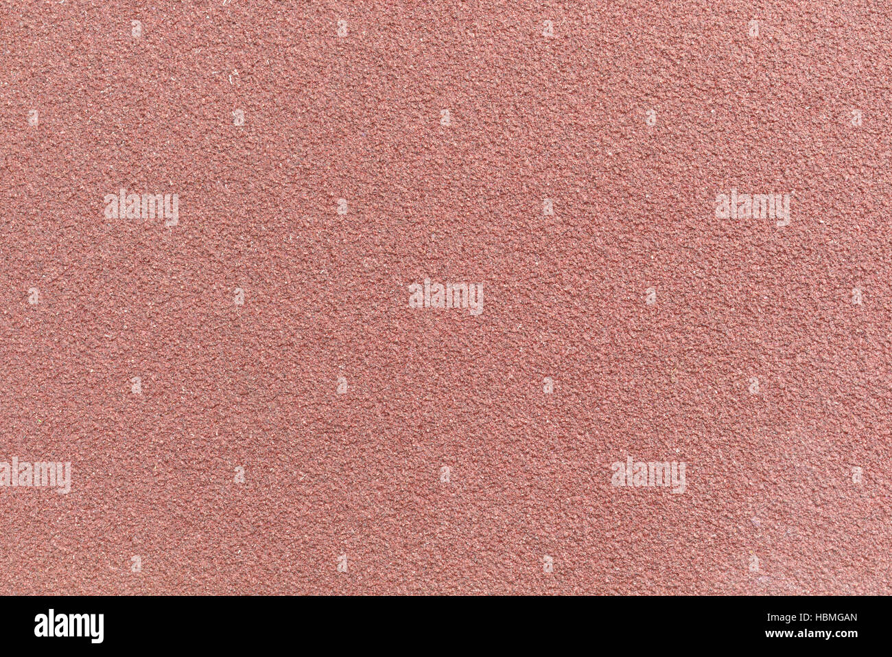 A very close view of maroon sandpaper Stock Photo - Alamy