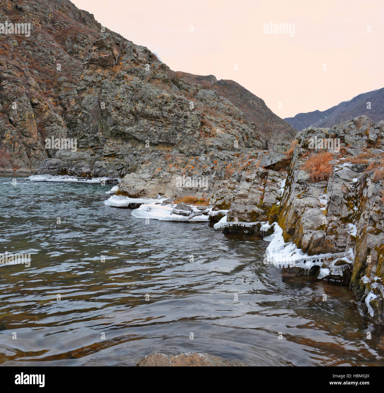Mountain village winter brook Stock Photo - Alamy