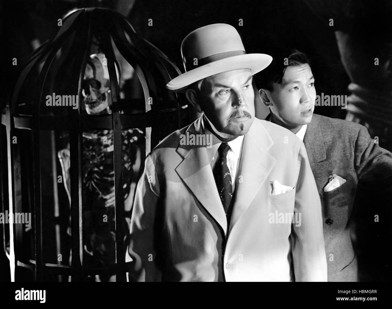 DARK ALIBI, from left: Sidney Toler, Benson Fong, 1946 Stock Photo - Alamy