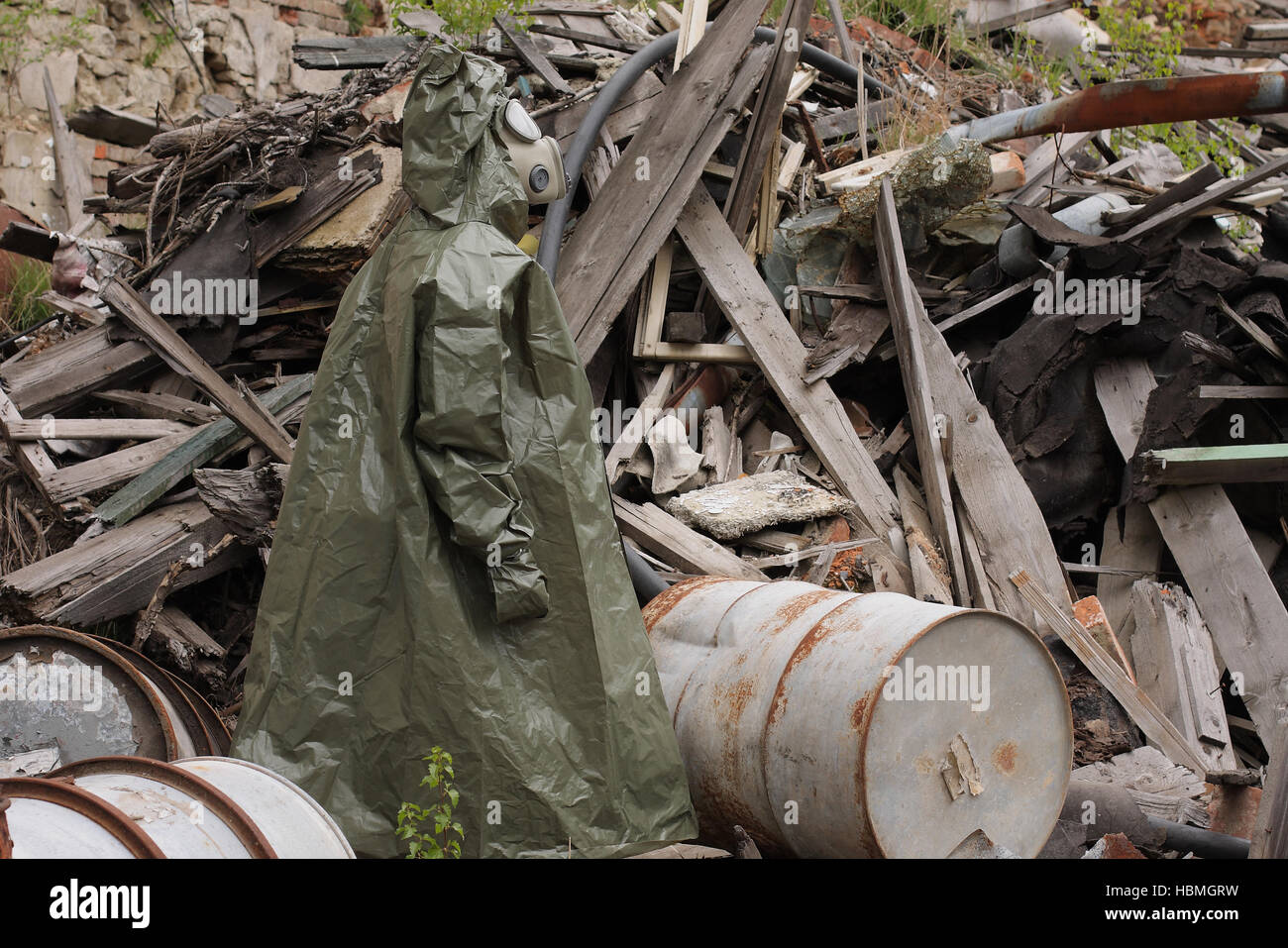 Man with gas mask and green military clothes after chemical disaster ...