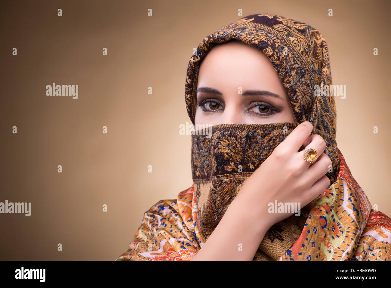 Young woman in traditional muslim clothing Stock Photo - Alamy
