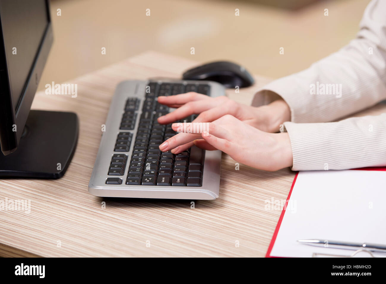 Hands working on the keyboard in the office Stock Photo - Alamy