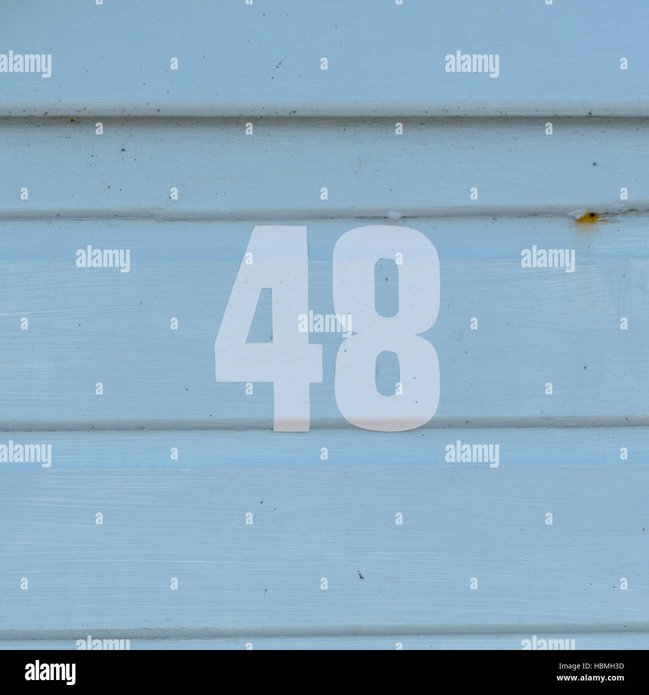 House Number 48 sign painted on door Stock Photo - Alamy