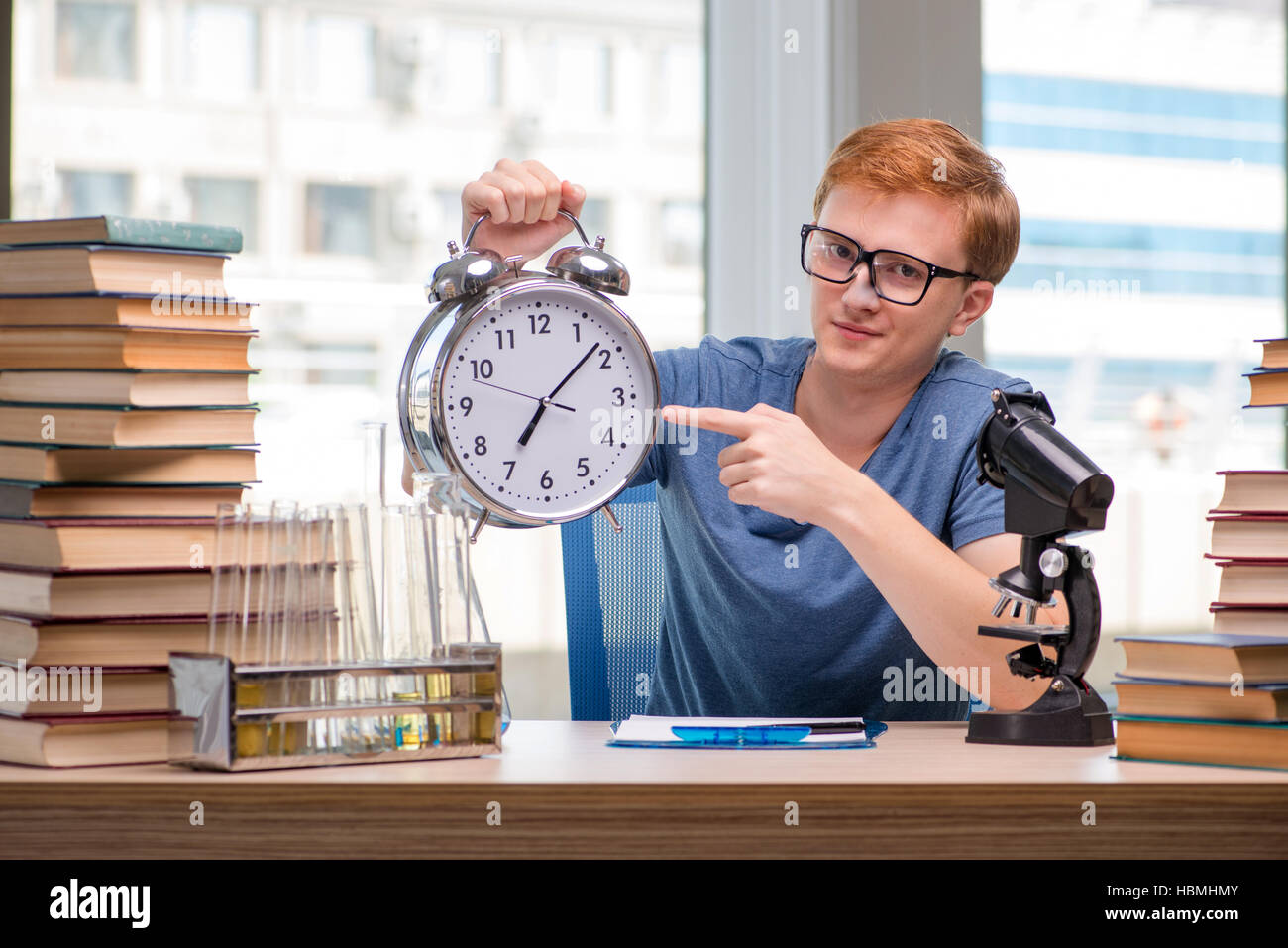 Young student preparing for chemistry exam Stock Photo - Alamy