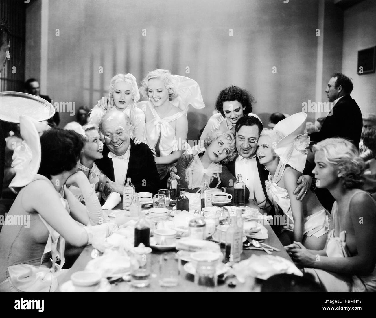 DAMES, seated facing front from left: Guy Kibbee, Joan Blondell, Hugh ...