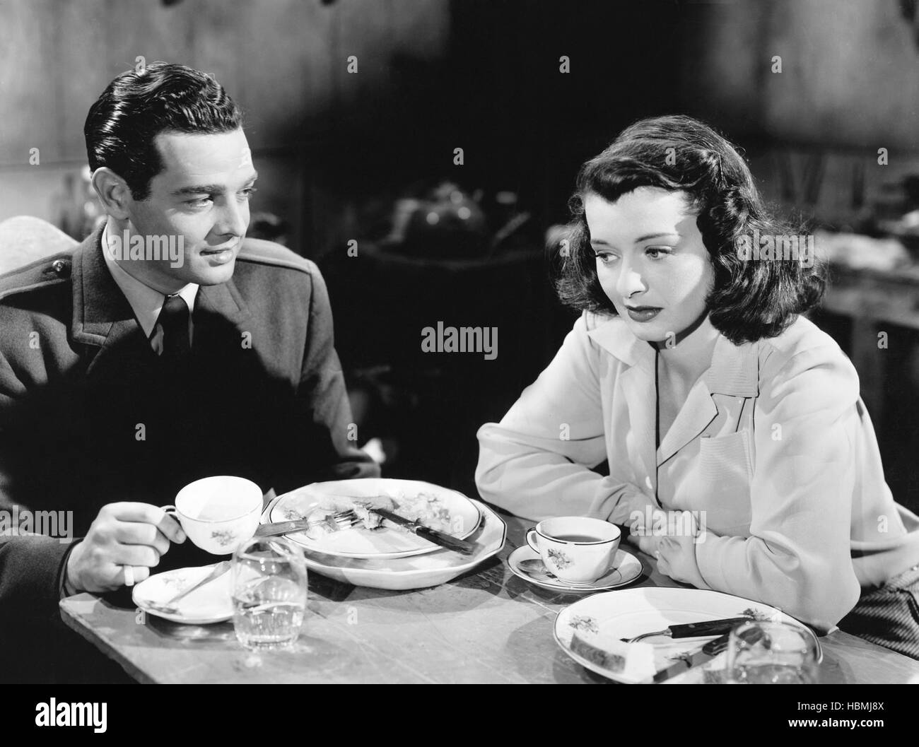 DARK MOUNTAIN, from left, Robert Lowery, Ellen Drew, 1944 Stock Photo ...