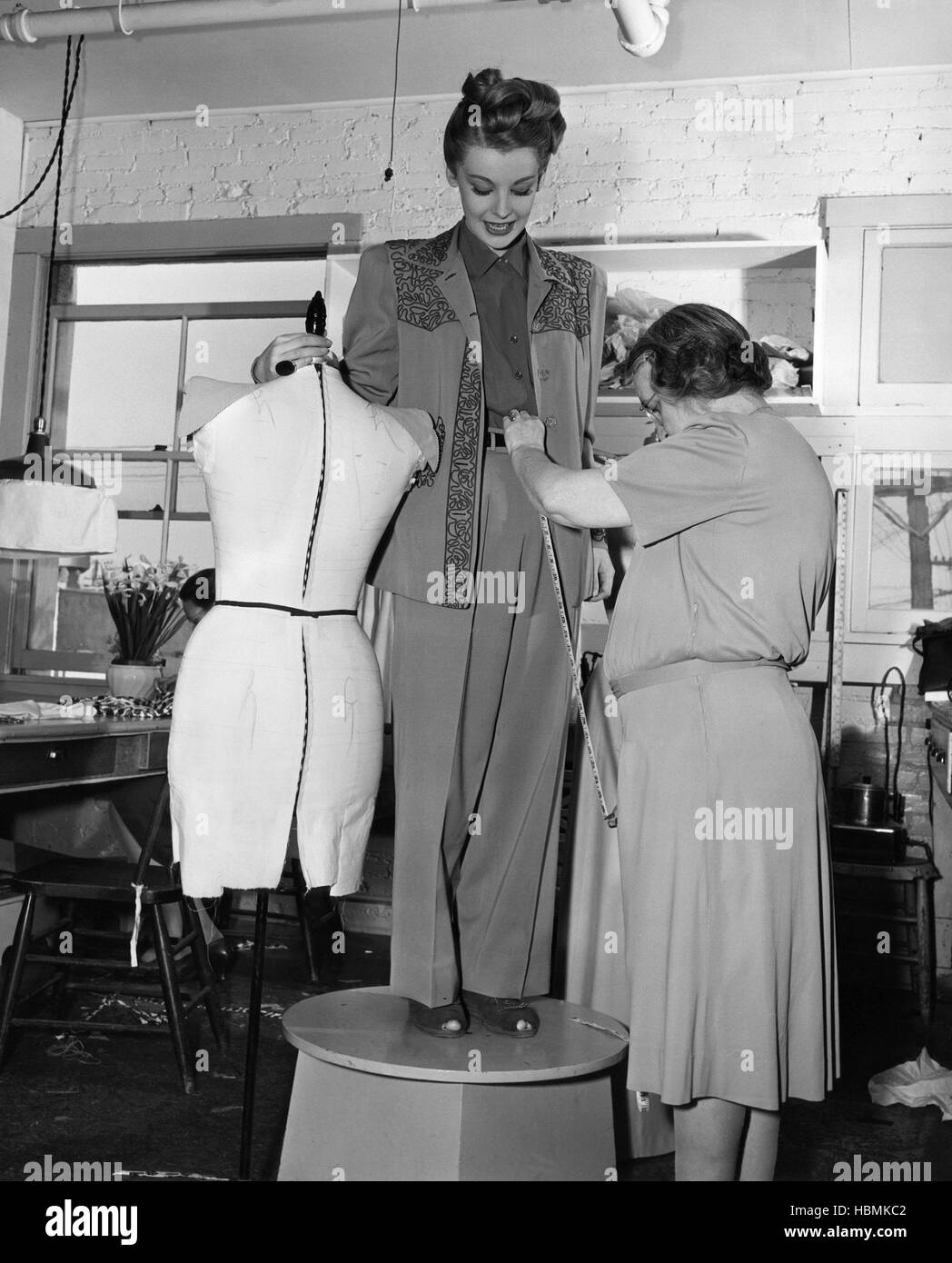 DANGEROUS PARTNERS, Signe Hasso (left) visiting the seamstress on MGM ...