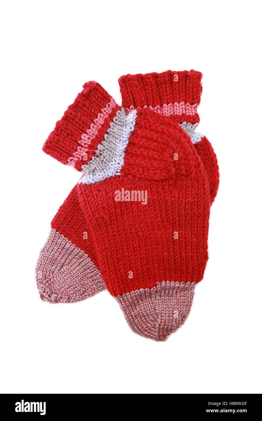 Knitted wool red socks on a white background Stock Photo - Alamy