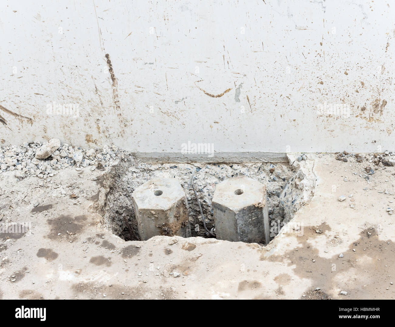 Hexagon concrete pole in the concrete floor of the construction house ...