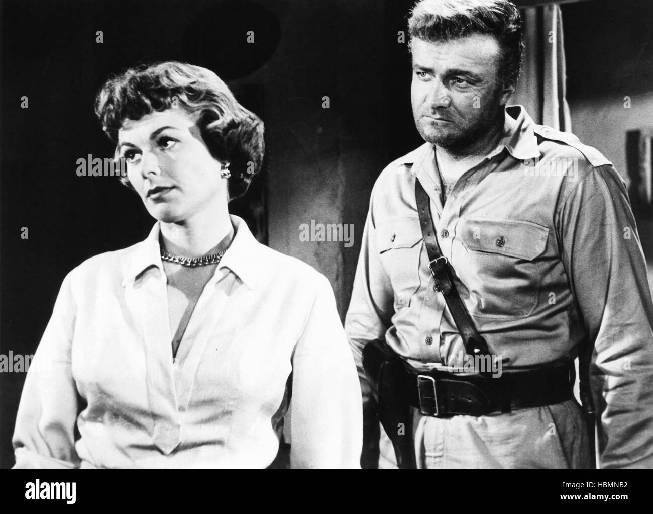 DESERT HELL, from left: Barbara Hale, Brian Keith, 1958 Stock Photo - Alamy