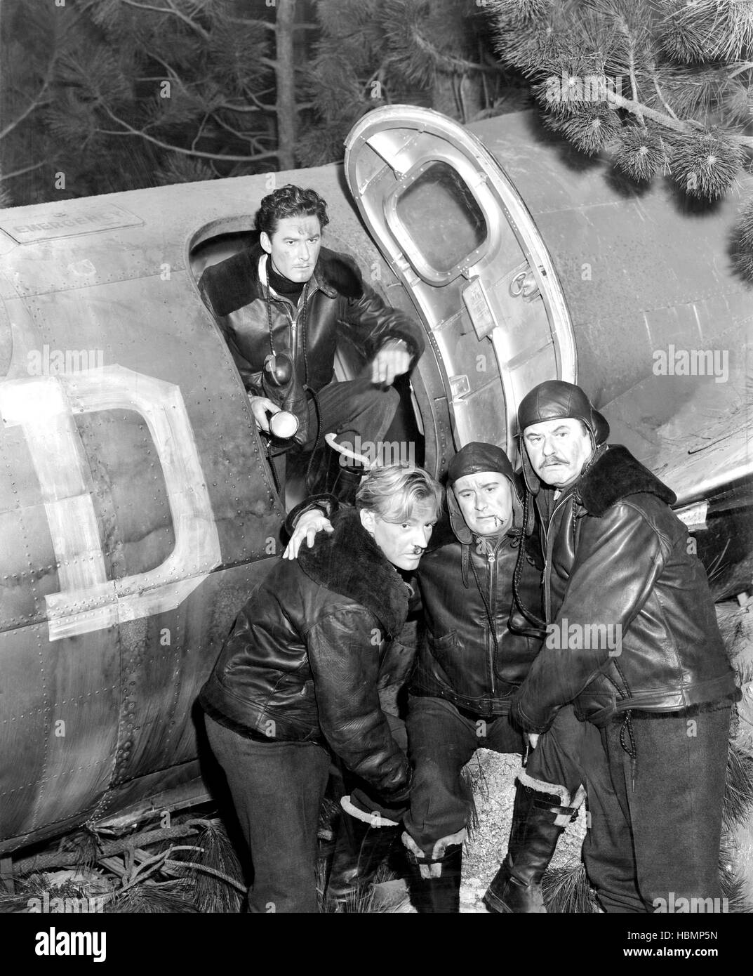 DESPERATE JOURNEY, Errol Flynn (back), Arthur Kennedy (left), Alan Hale ...