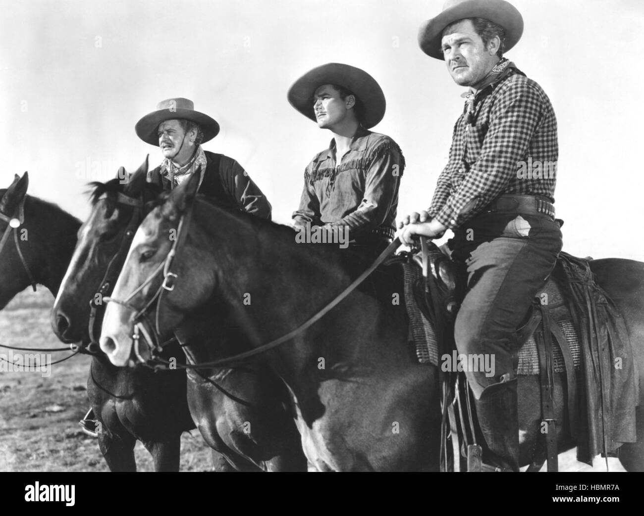 DODGE CITY, from left: Alan Hale, Errol Flynn, Guinn Williams, 1939 ...