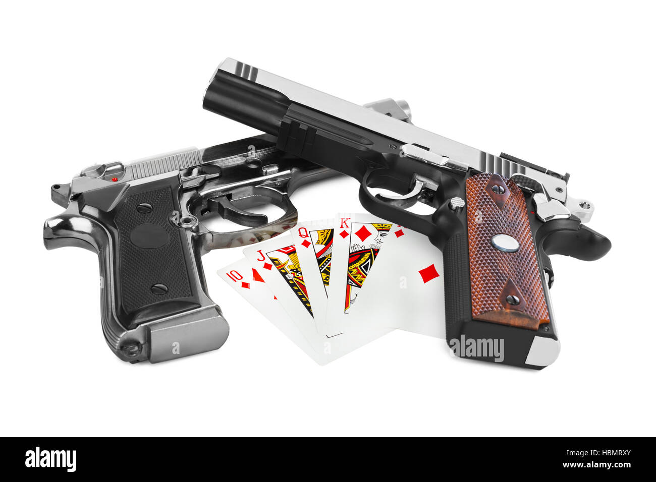 Guns and playing cards Stock Photo - Alamy