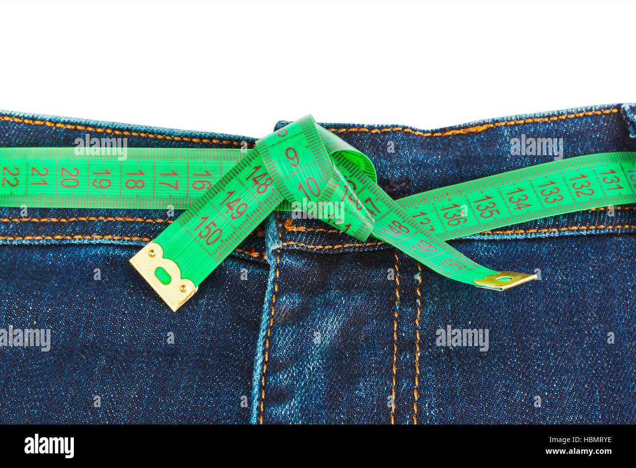 Jeans and measuring tape - slimming concept Stock Photo - Alamy