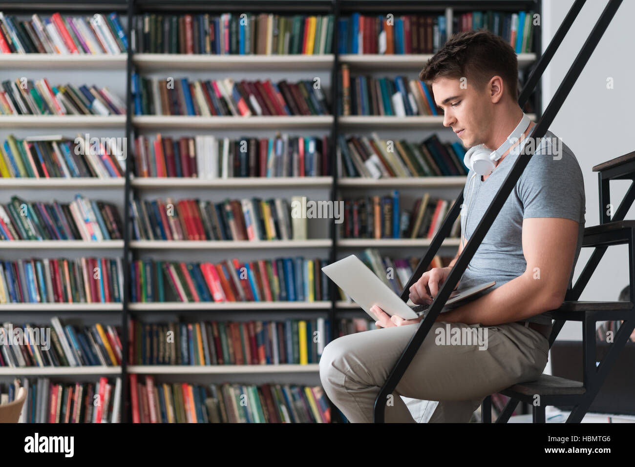 Young students with laptop Stock Photo - Alamy