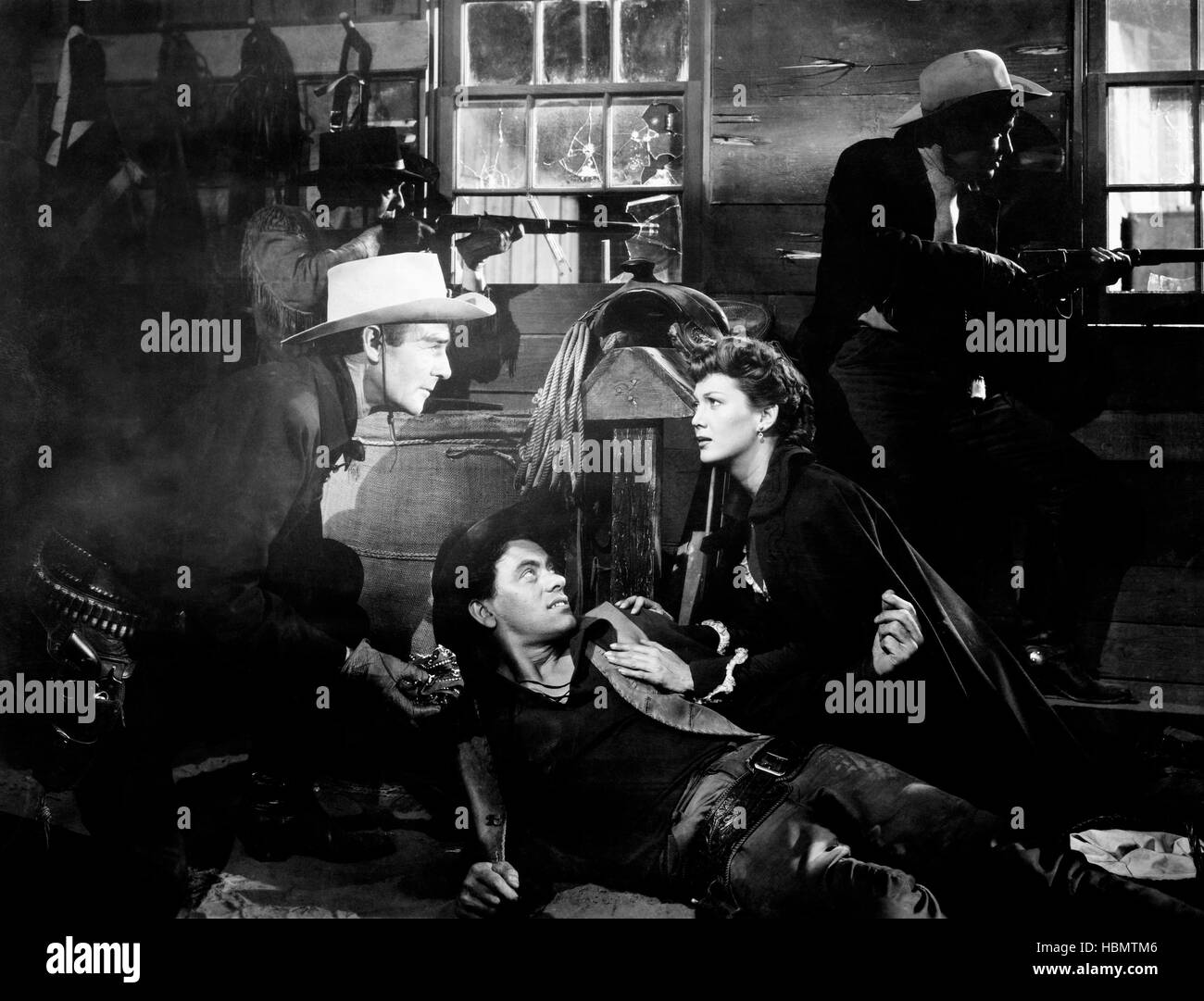 THE DOOLINS OF OKLAHOMA, front from left: Randolph Scott, John Ireland ...