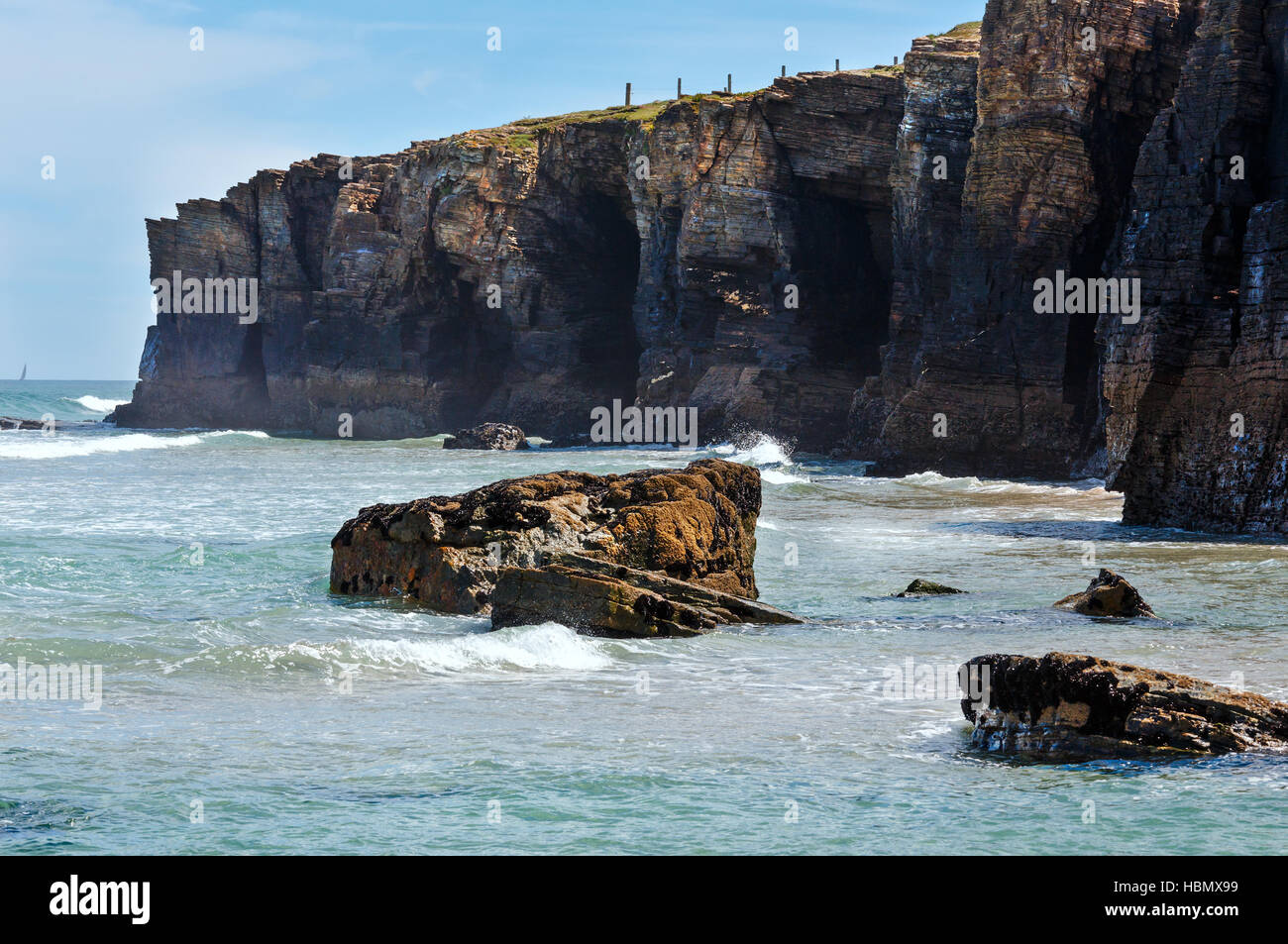 Natural arches on beach Stock Photo - Alamy