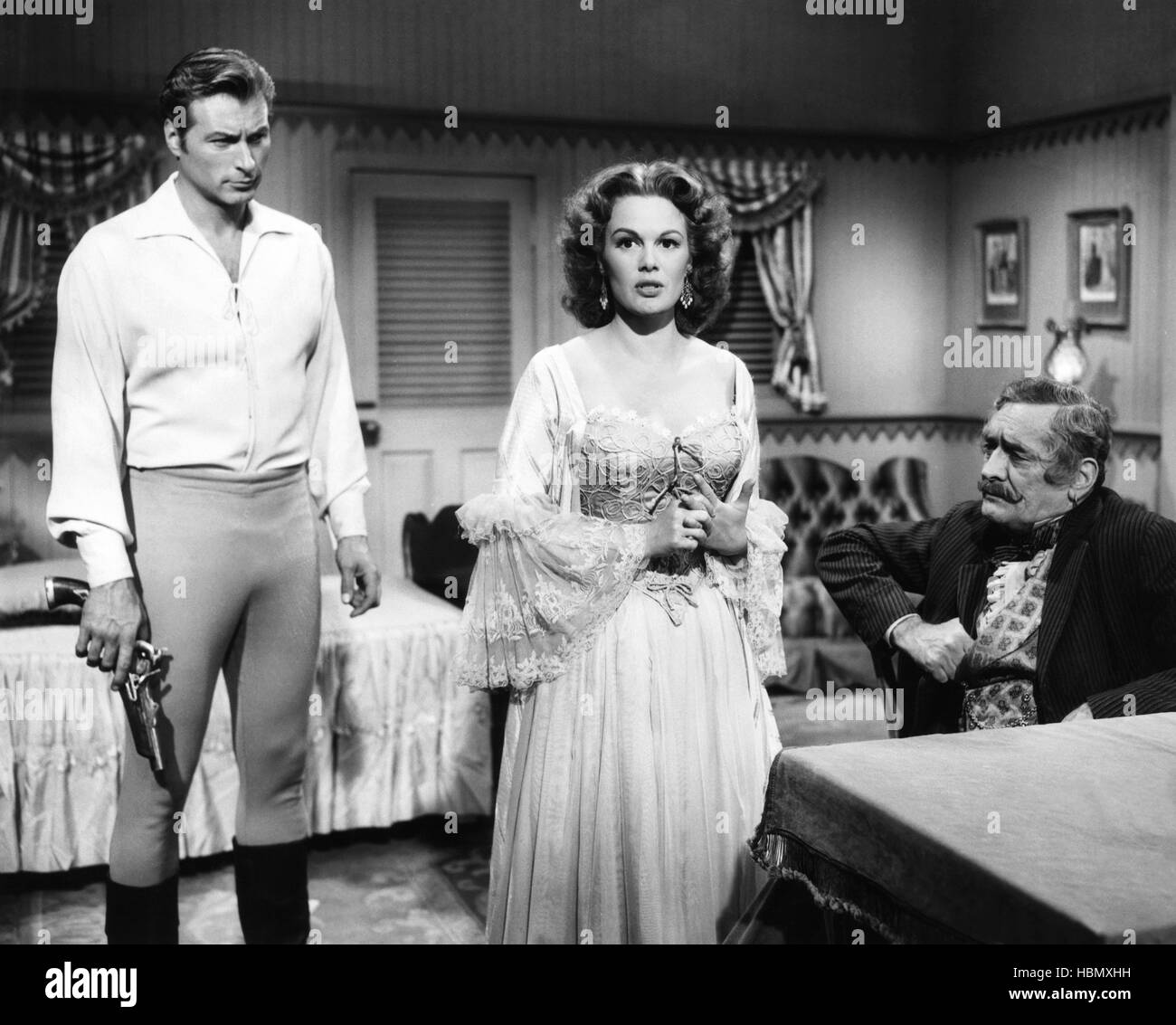 DUEL ON THE MISSISSIPPI, from left: Lex Barker, Patricia Medina, Ian ...
