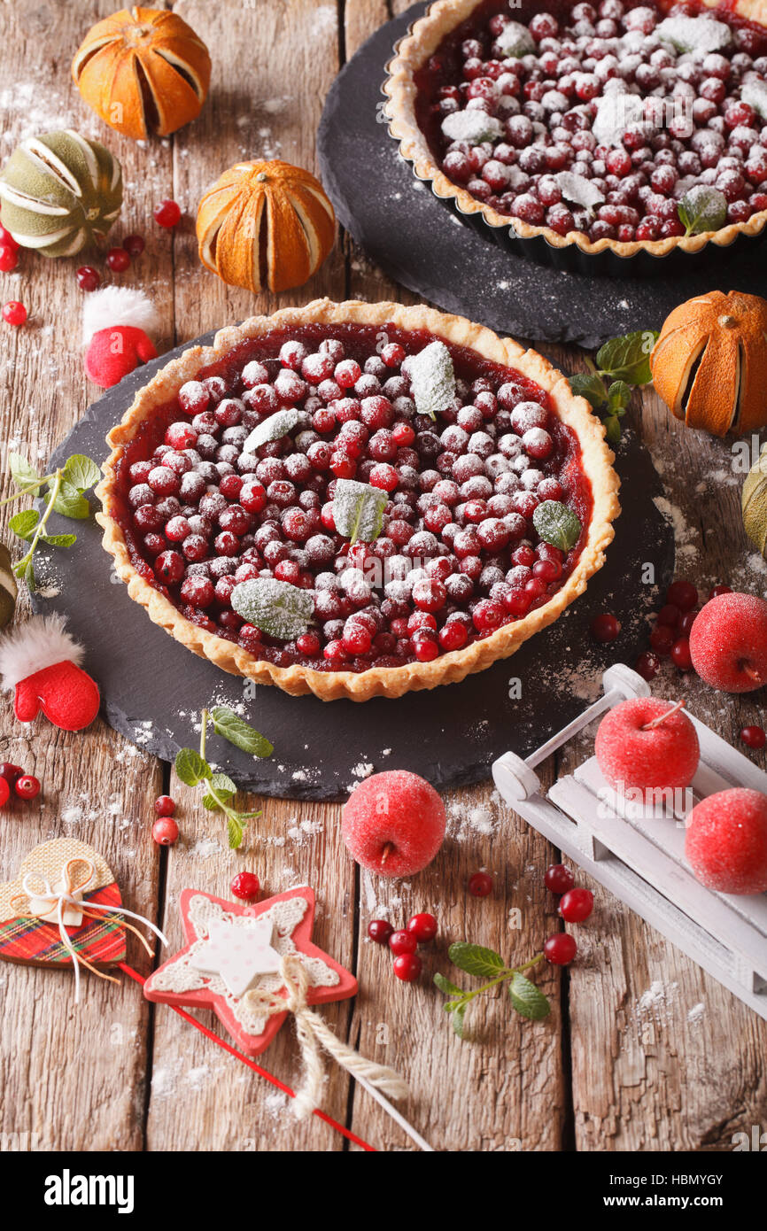 Freshly baked Christmas cranberry tart with icing sugar and festive ...