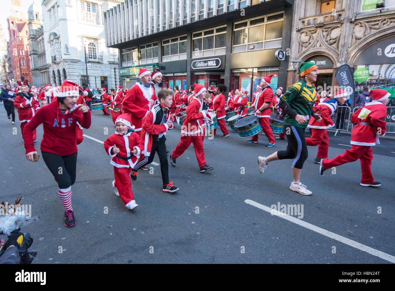 Katumba drummers at the 2016 Santa 2016 Santa Dash in Liverpool which broke the world record for ...