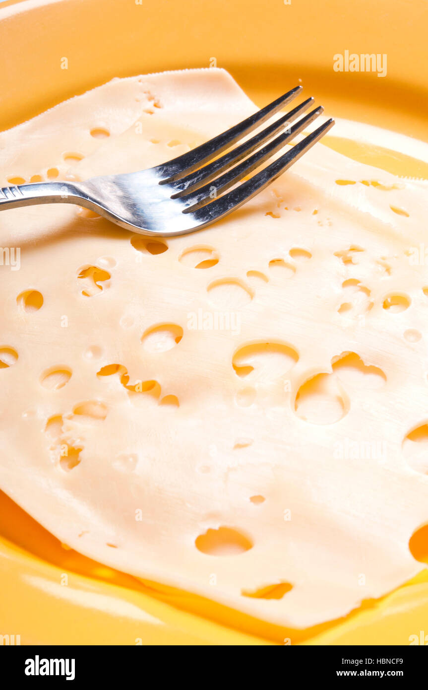 Emmental cheese sliced Stock Photo - Alamy