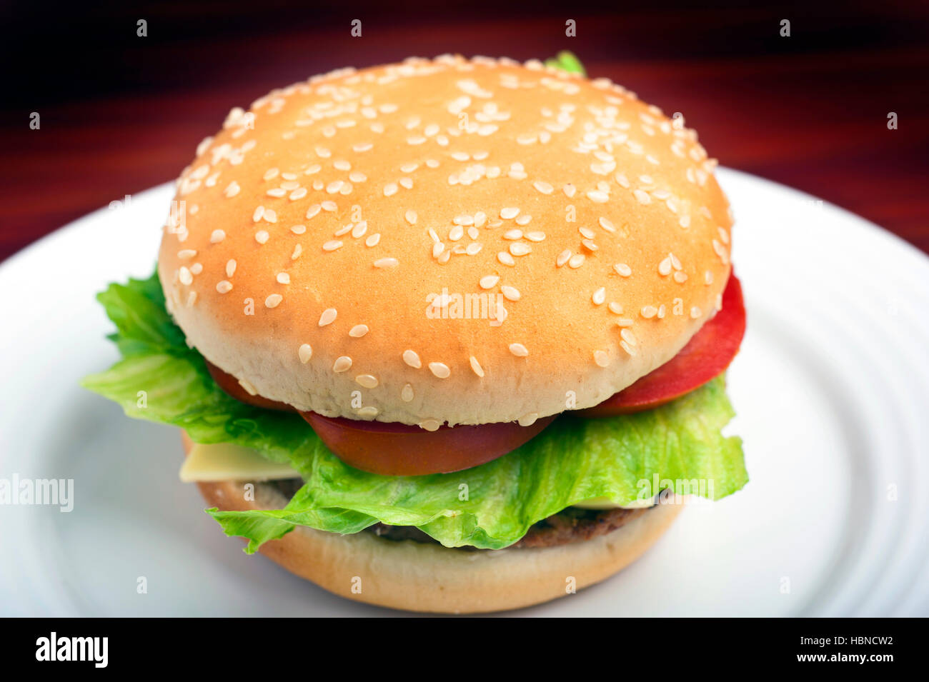 cheeseburger on a plate Stock Photo - Alamy