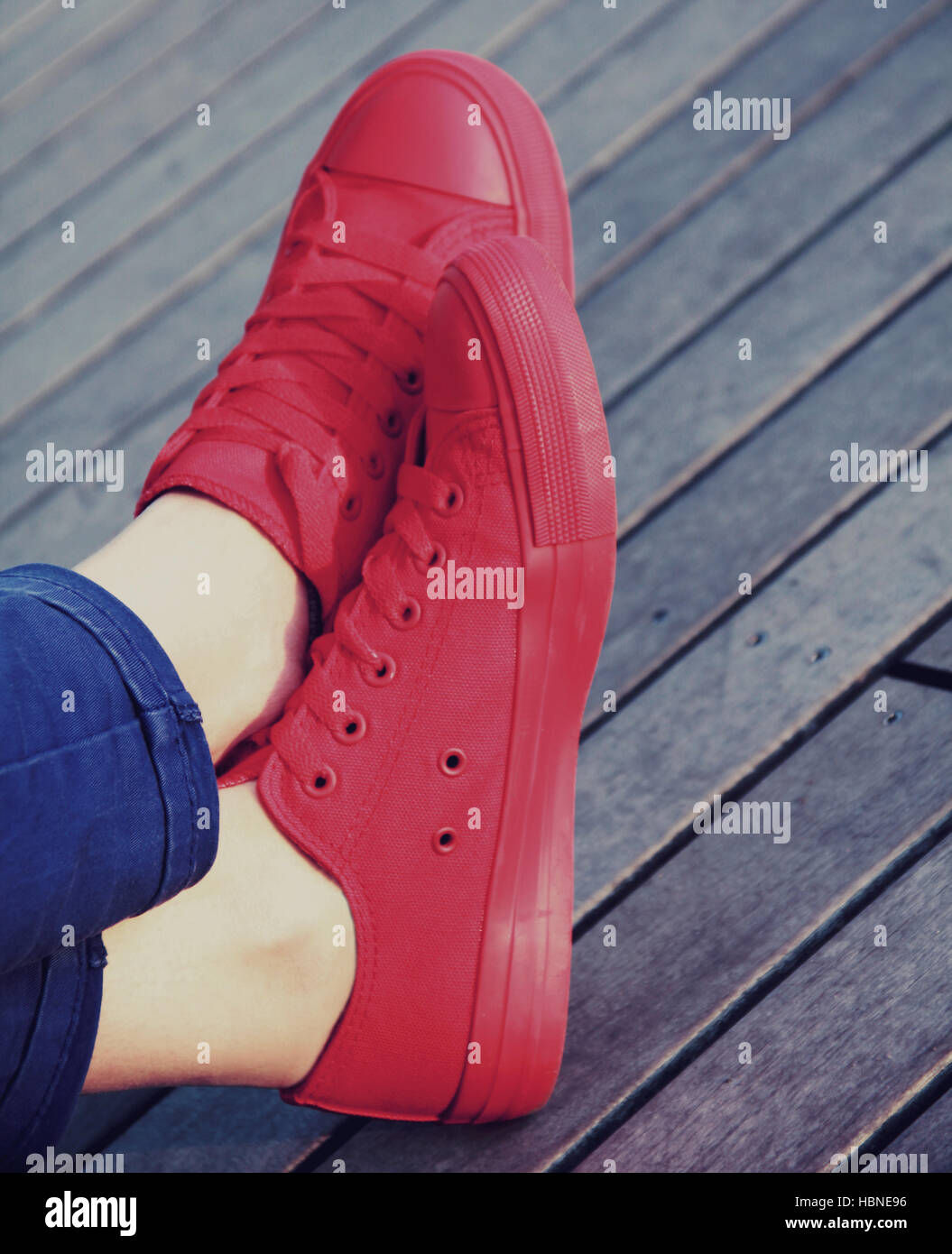 Red sneakers hi-res stock photography and images - Alamy