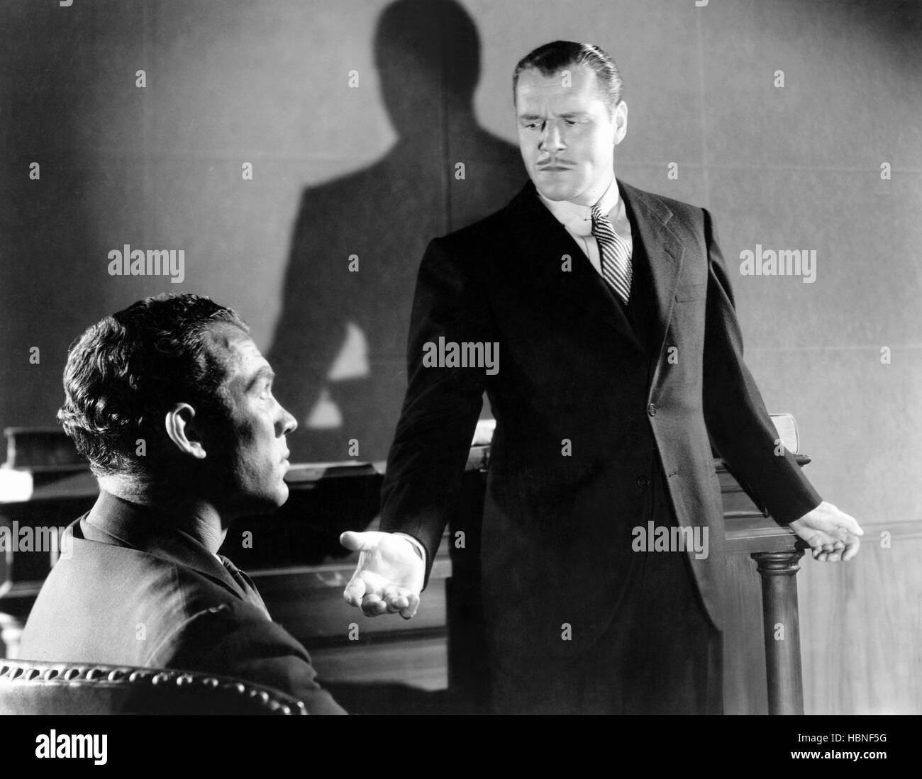 THE DEFENSE RESTS, from left: Ward Bond, Jack Holt, 1934 Stock Photo ...