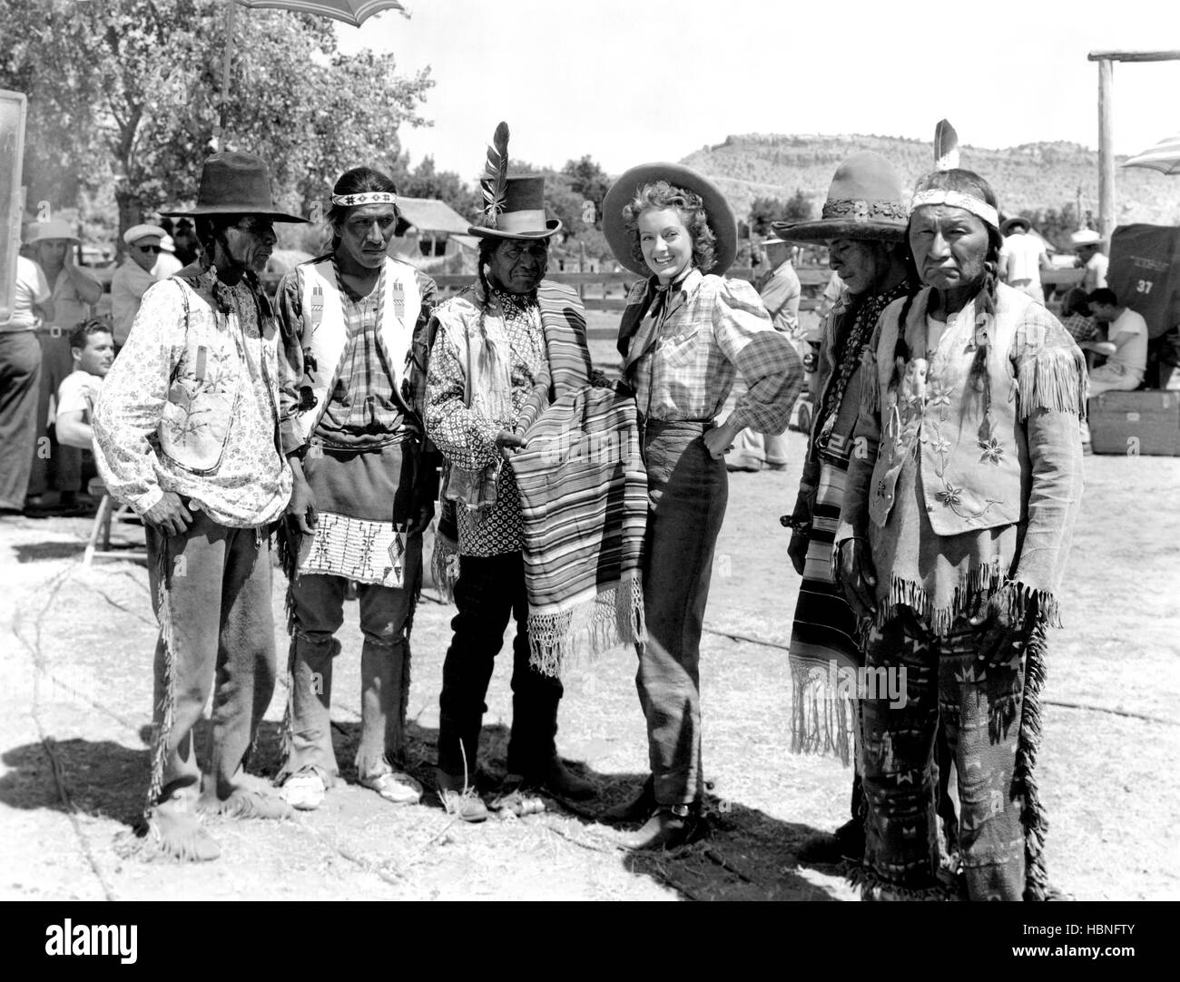 THE DESPERADOES, Evelyn Keyes, with Piute and Navajo actors (from left ...