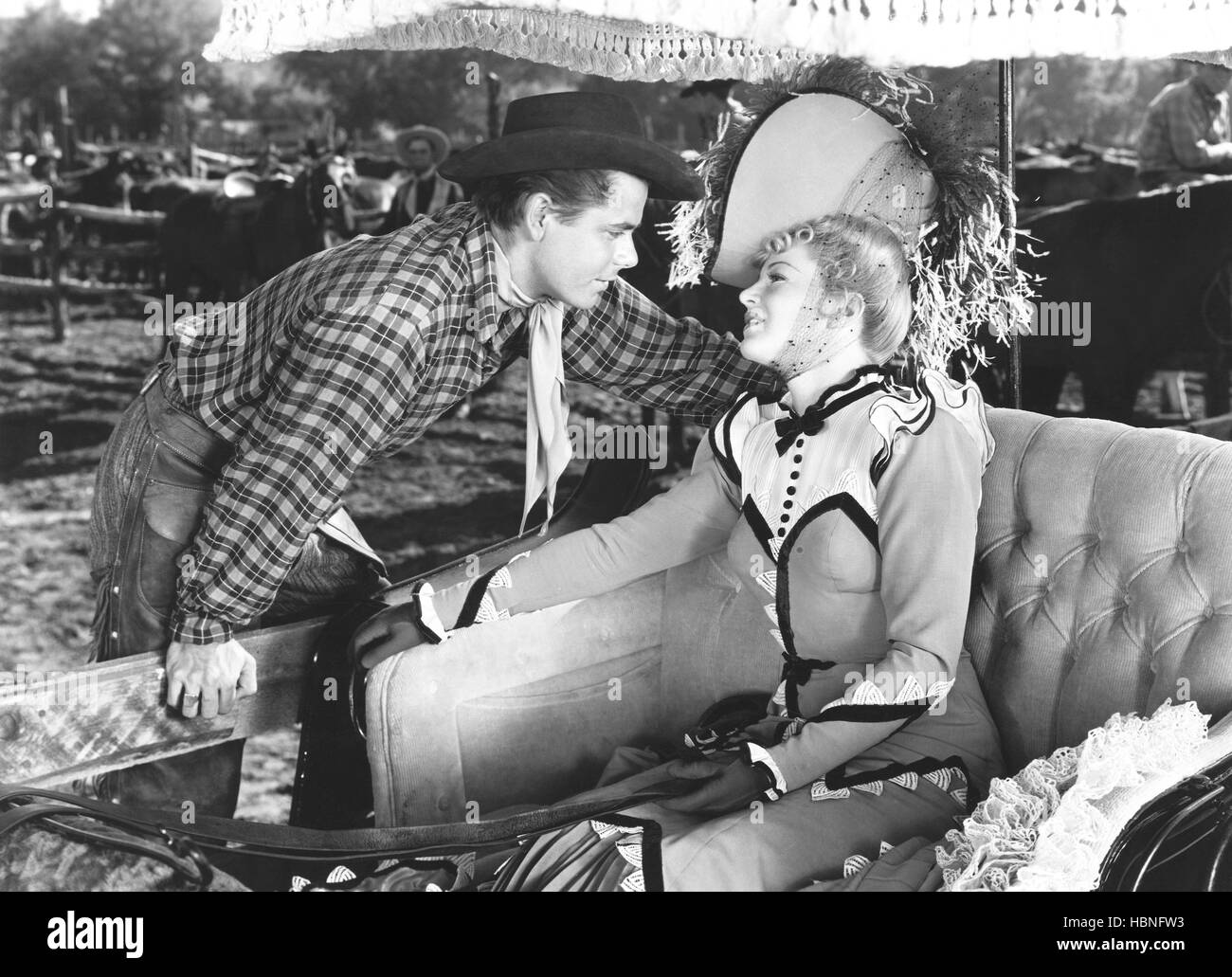 THE DESPERADOES, from left: Glenn Ford, Claire Trevor, 1943 Stock Photo ...