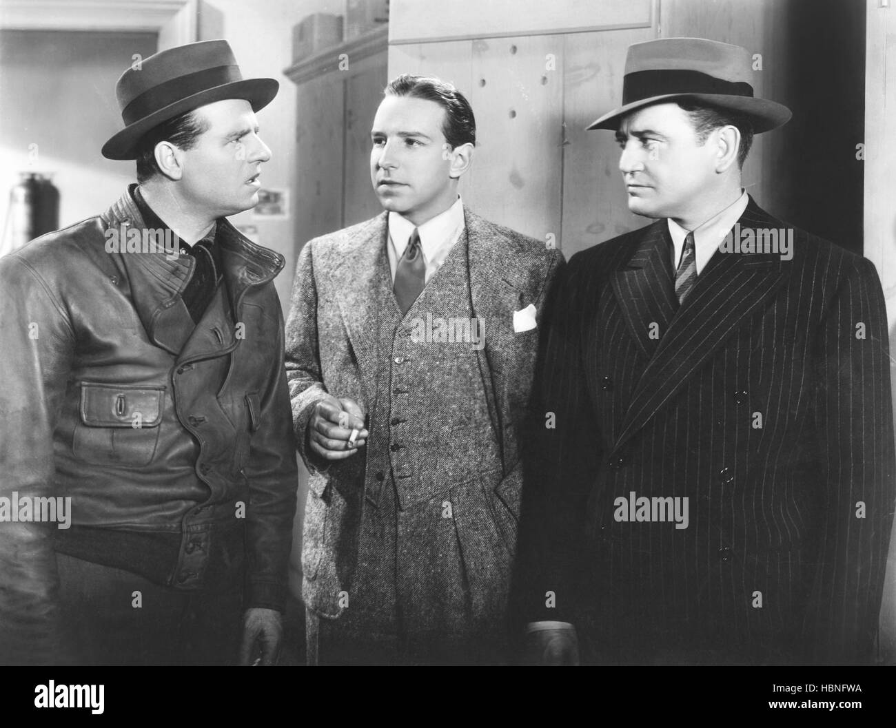 DEVIL'S SQUADRON, from left: Gene Morgan, Lloyd Nolan, Richard Dix, 1936 Stock Photo - Alamy