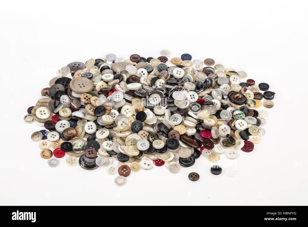 Heap Of Tailor Buttons On White Stock Photo - Alamy