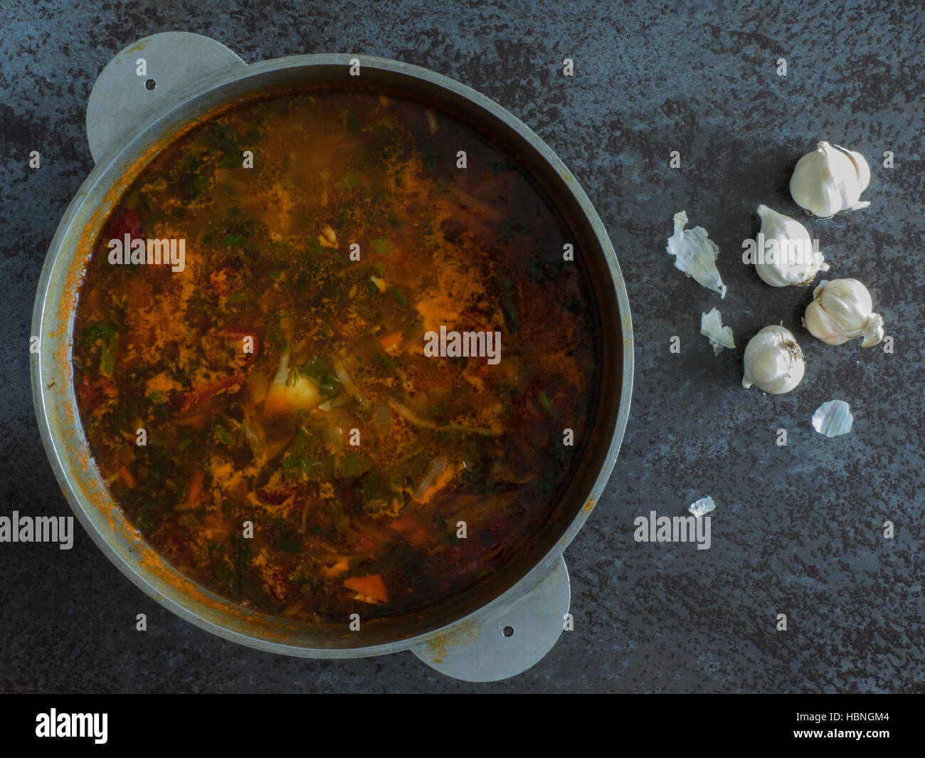 Top view of soup in a saucepan on the stone table Stock Photo - Alamy