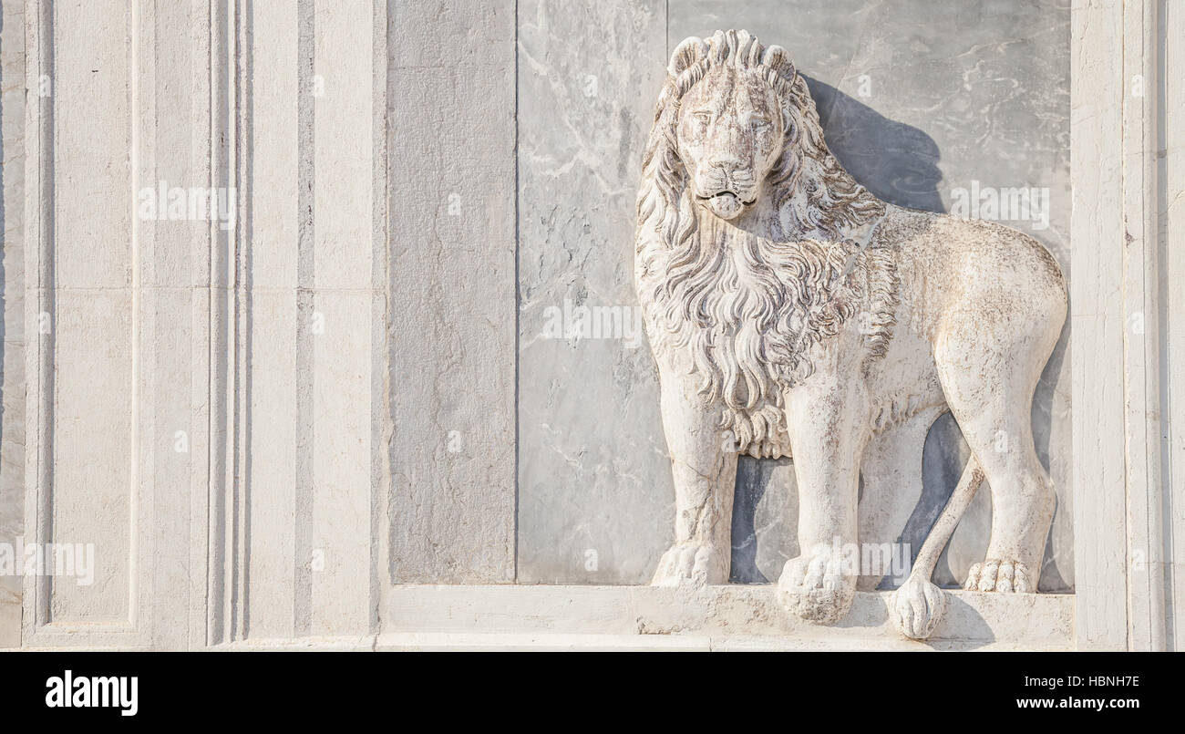 Marble lion on church facade Stock Photo - Alamy