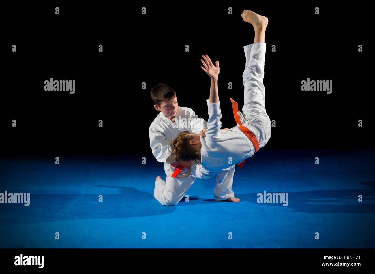 Children martial arts fighters isolated Stock Photo - Alamy