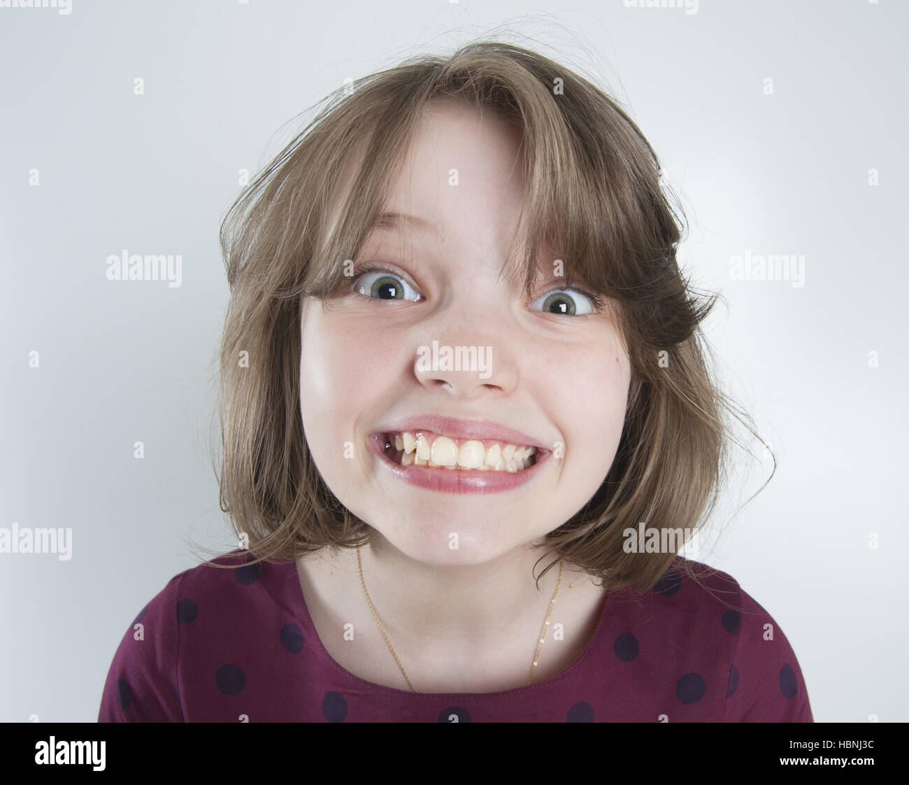 Ten-year girl with a funny smile Stock Photo - Alamy
