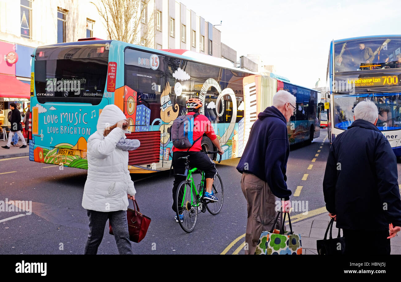 Cyclist cycling busy traffic bus hi-res stock photography and images ...
