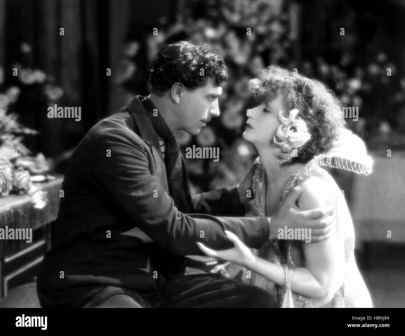 THE DIVINE WOMAN, from left, Lars Hanson, Greta Garbo, 1928 Stock Photo ...