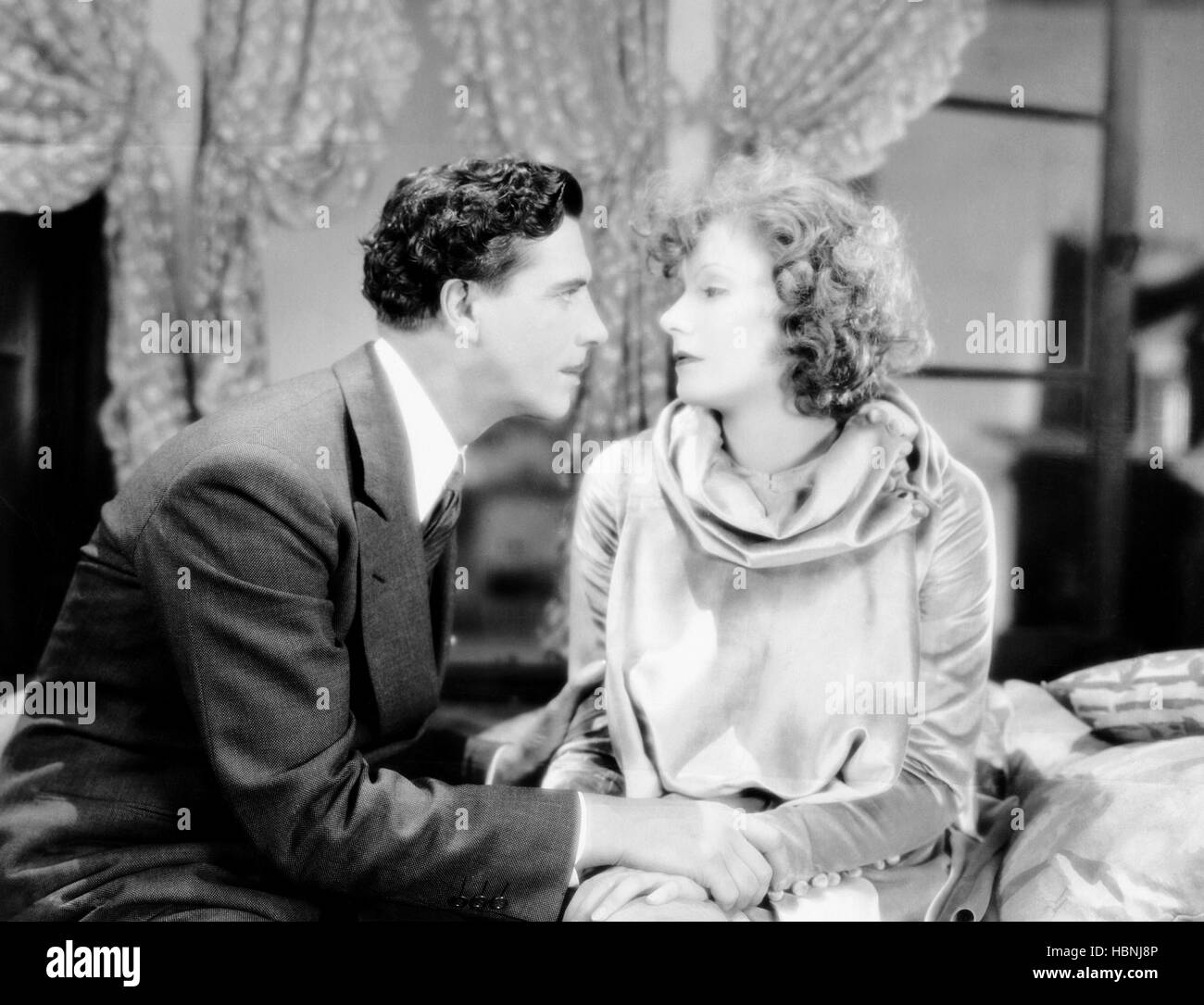 THE DIVINE WOMAN, from left: Lars Hanson, Greta Garbo, 1928 Stock Photo ...