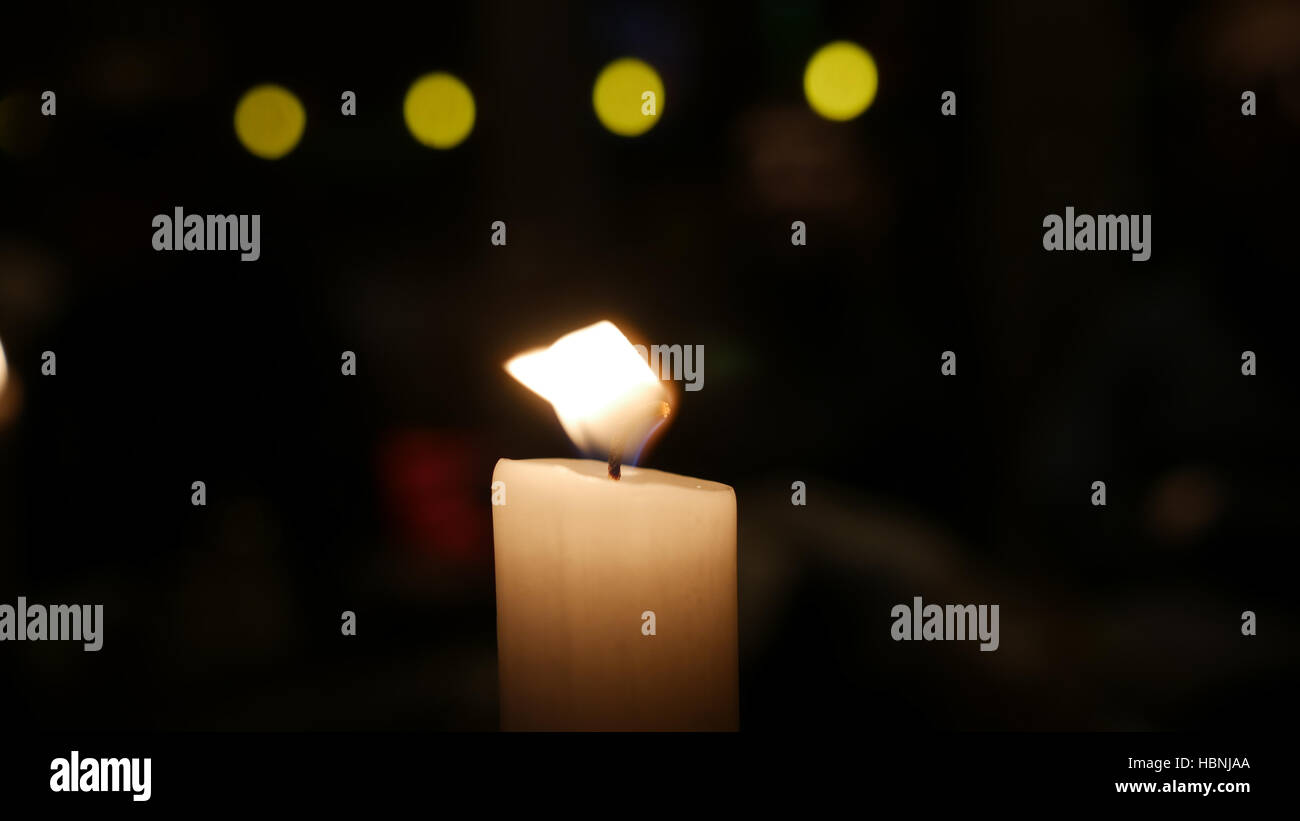 Bright burning candle celebration hi-res stock photography and images ...