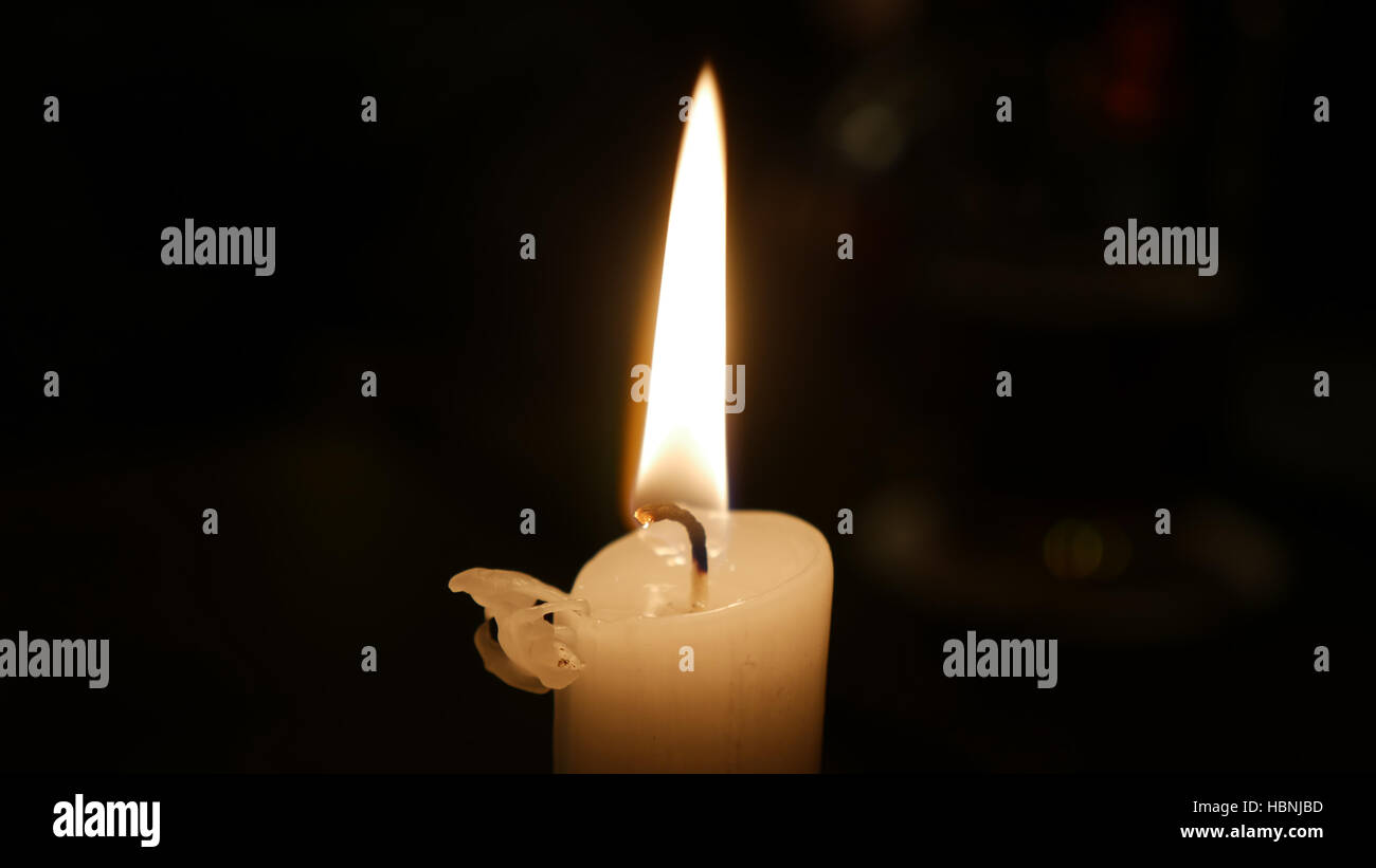 Bright burning candle celebration hi-res stock photography and images ...