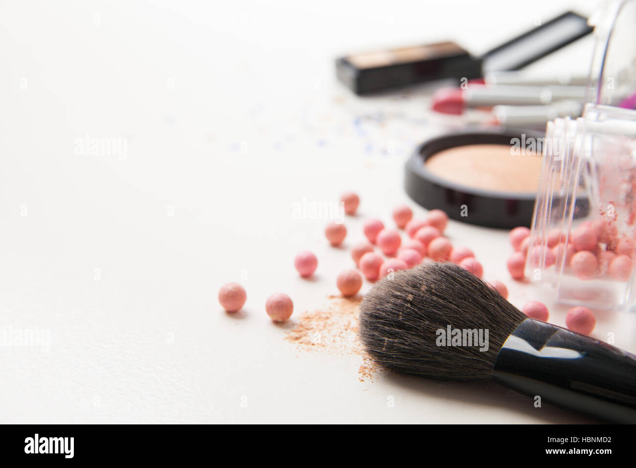 Brush laying near makeup. Isolated horizontal studio shot Stock Photo ...