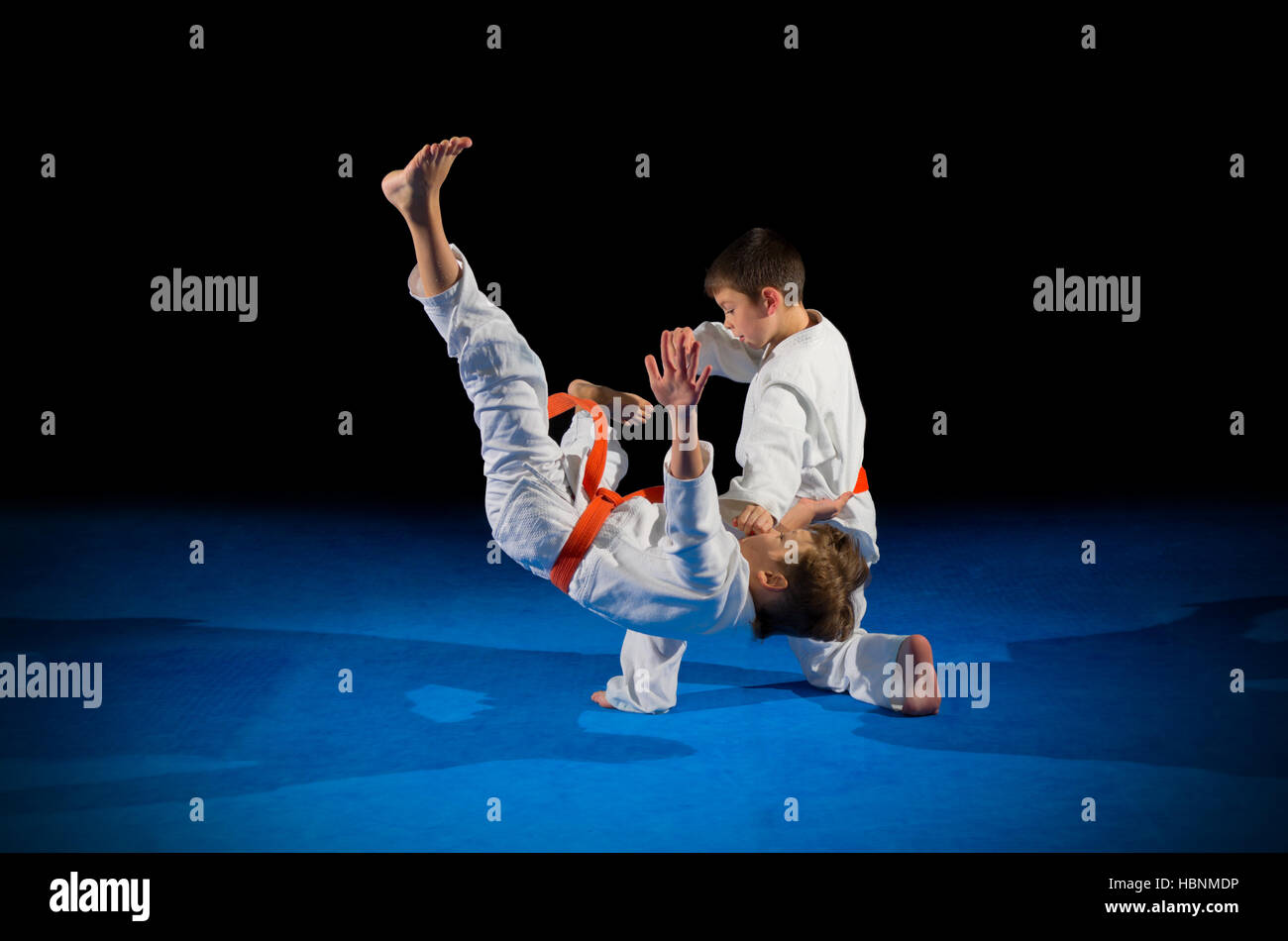 Little boys martial arts fighters isolated Stock Photo - Alamy