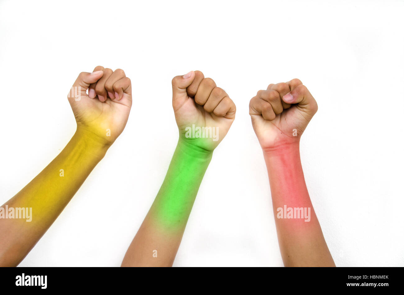 hand and fist from children for victory with red yellow green pain on ...