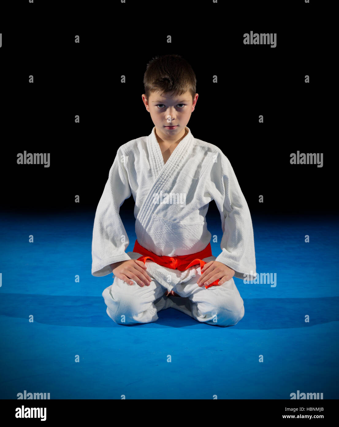 Little boy martial arts fighter isolated Stock Photo - Alamy